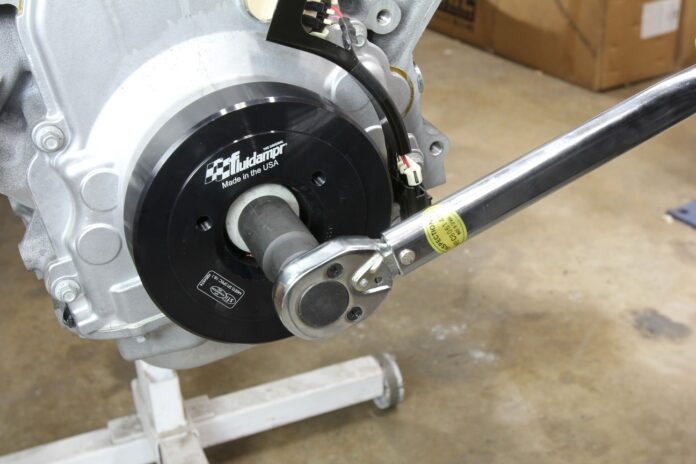 Installation process of a Concept One pulley system on a LS3 engine.