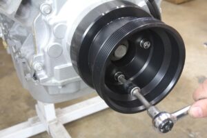 Installation process of a Concept One pulley system on a LS3 engine.